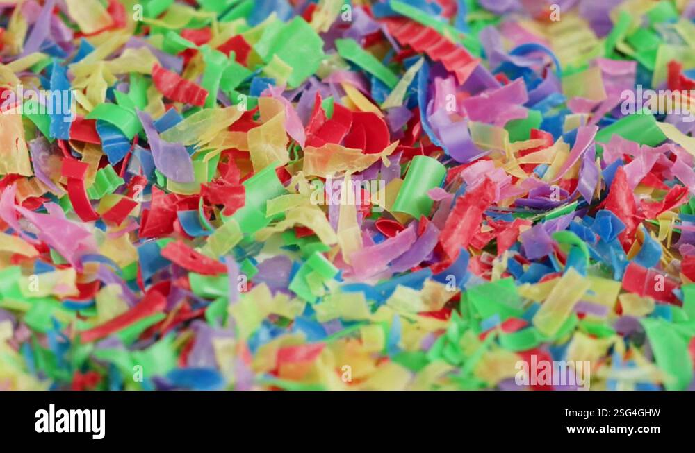 Microplastic pollution, plastic particles top view rotating, garbage ...