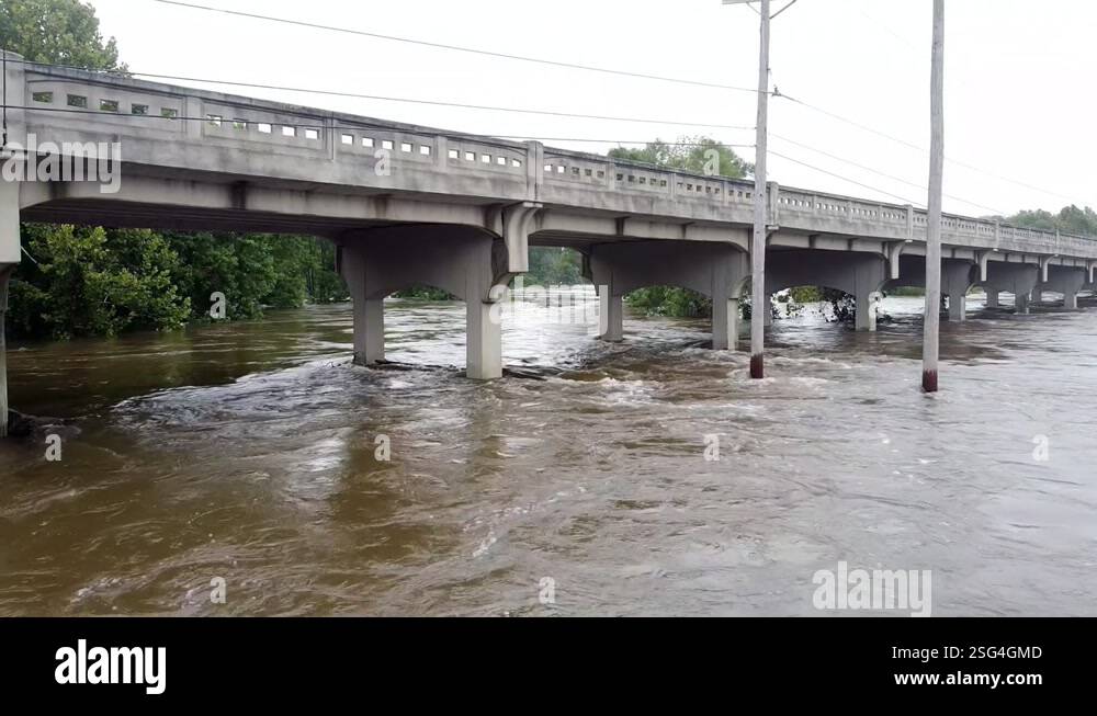Powerlines beside bridge flooded by the Pearl River, Jackson MS 2 Stock ...
