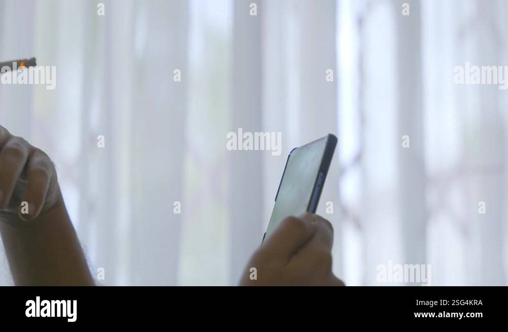 Man Smoking Cigarette Using While Using A Mobile Phone Stock Video ...