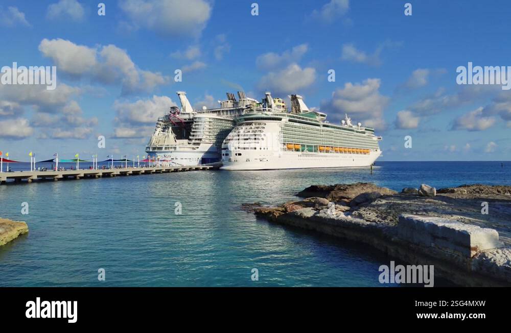Luxury cruise ships docked next to each other in port of Nassau ...