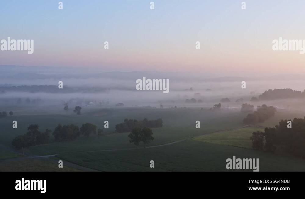 A beautiful dawn flight over low lying fog in the Shenandoah Valley ...