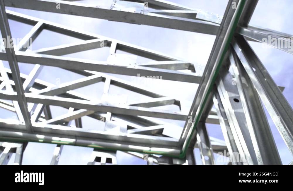 sliding images of the waterpipes going through the steel frames of a ...