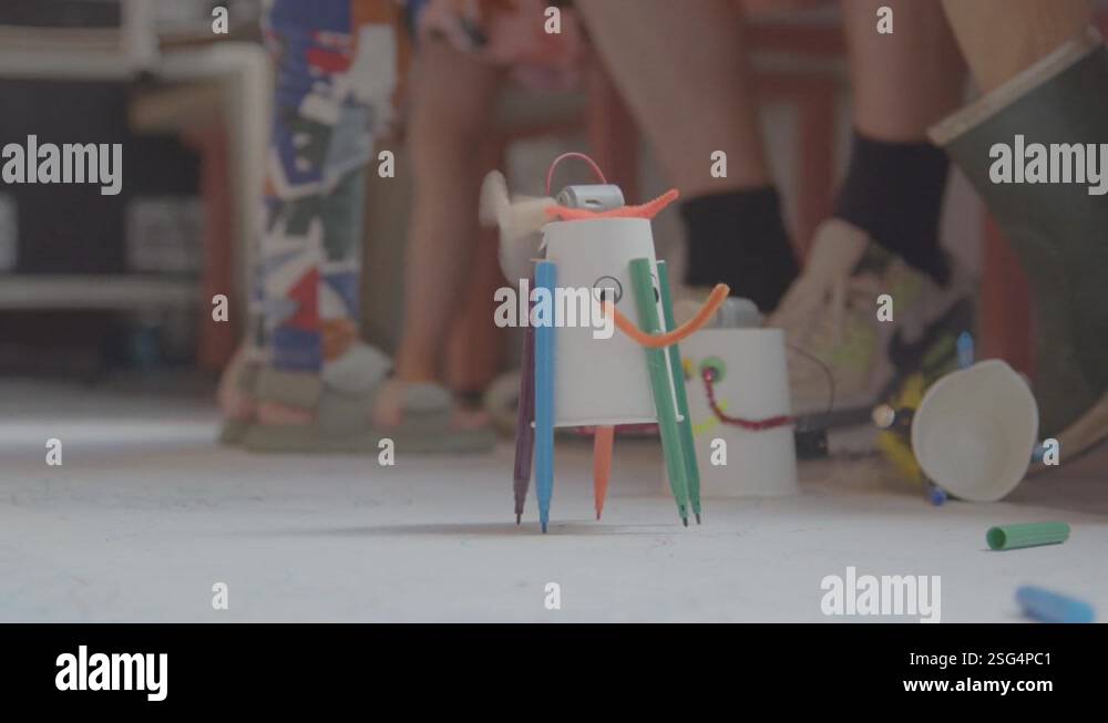 Small self made robot with markers turning around on floor Stock Video ...