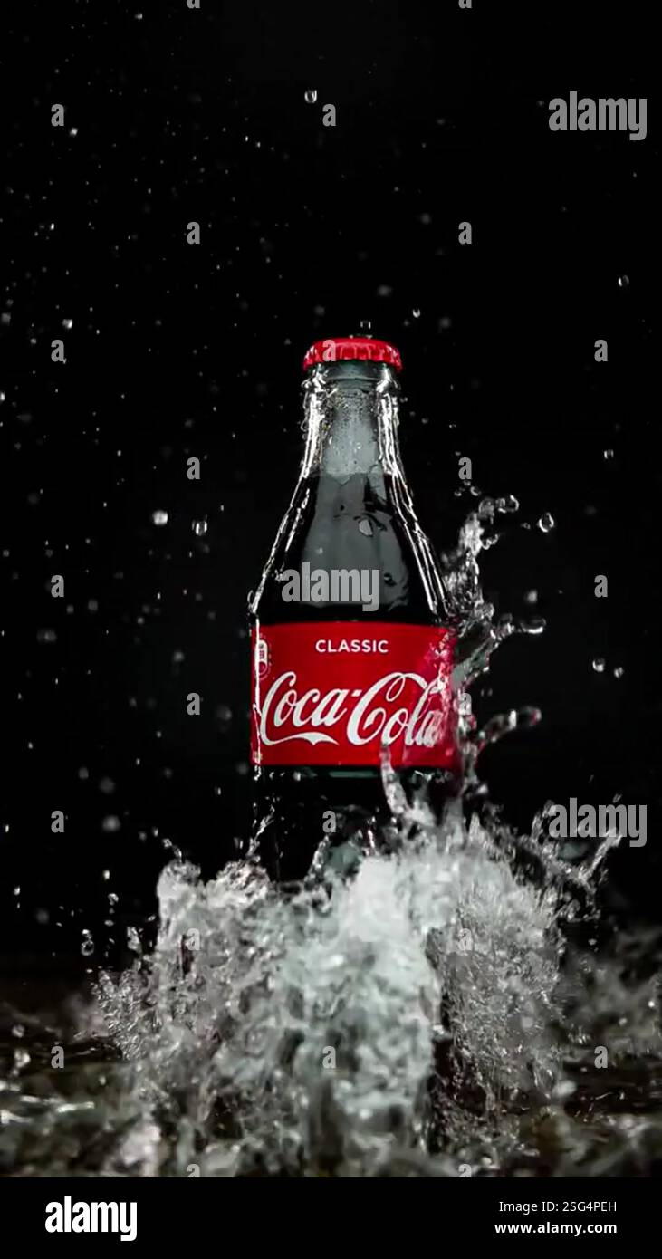Krivoy Rog, Ukraine - 31.08.2022 super slow motion, cola and ice cubes ...