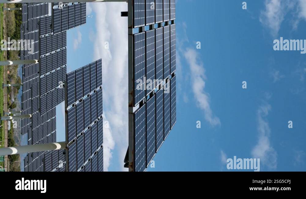 Solar Panels Tracking the Sun for Efficiency (Vertical, Timelapse ...