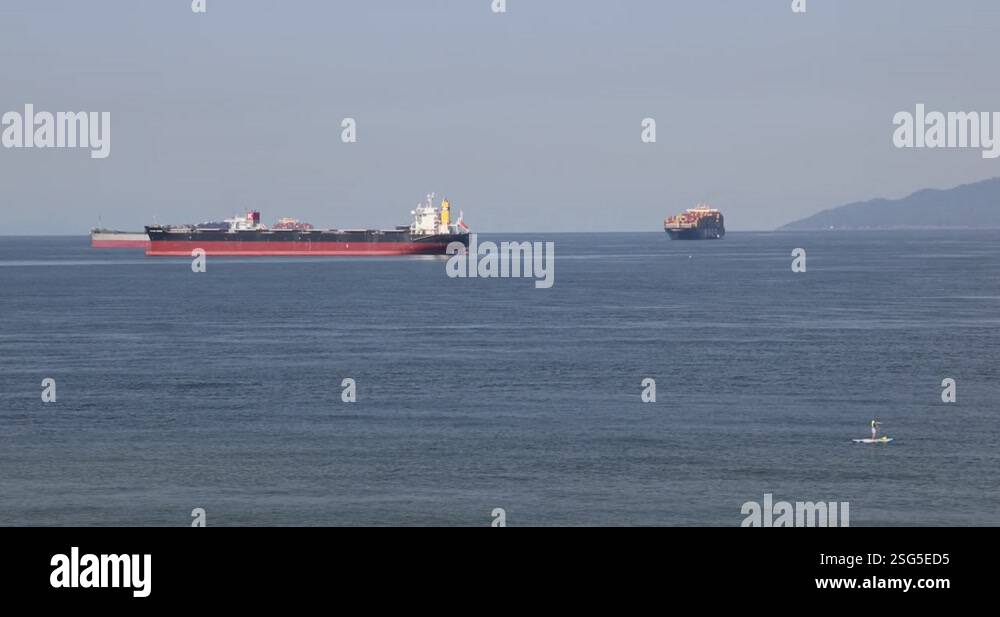 Cargo ships paddle board Vancouver Island Canada 4K Stock Video Footage ...