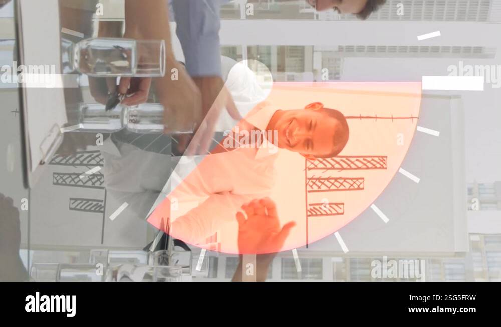 Animation of clock over diverse business people shaking hands Stock ...