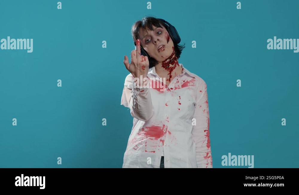 Scary looking spooky mindless monster being rude by showing middle ...