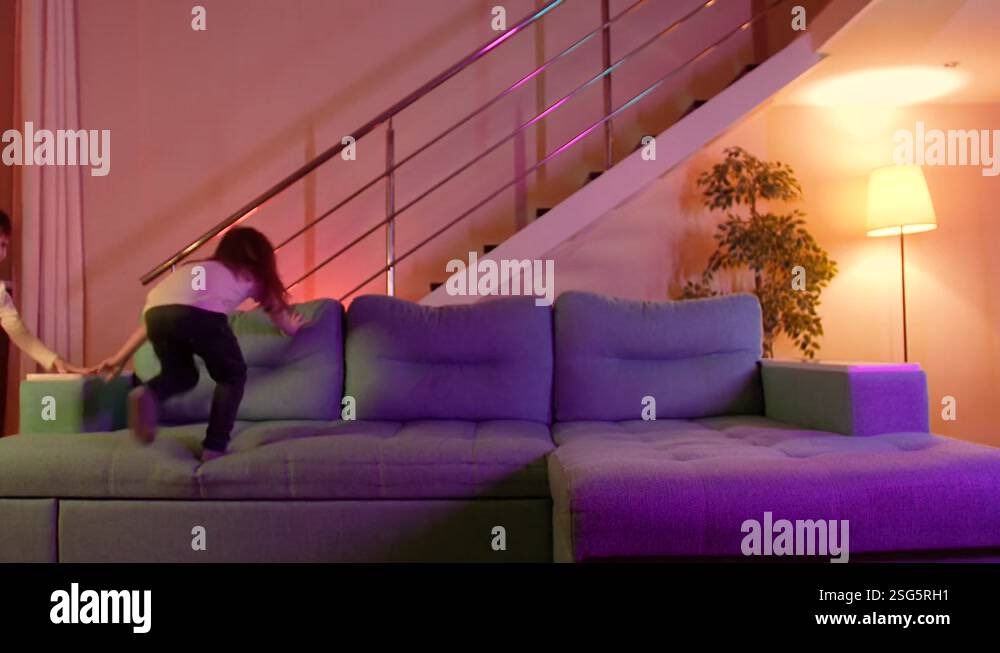 Little Kids Brother And Sister Fooling Around Alone At Home. Running ...