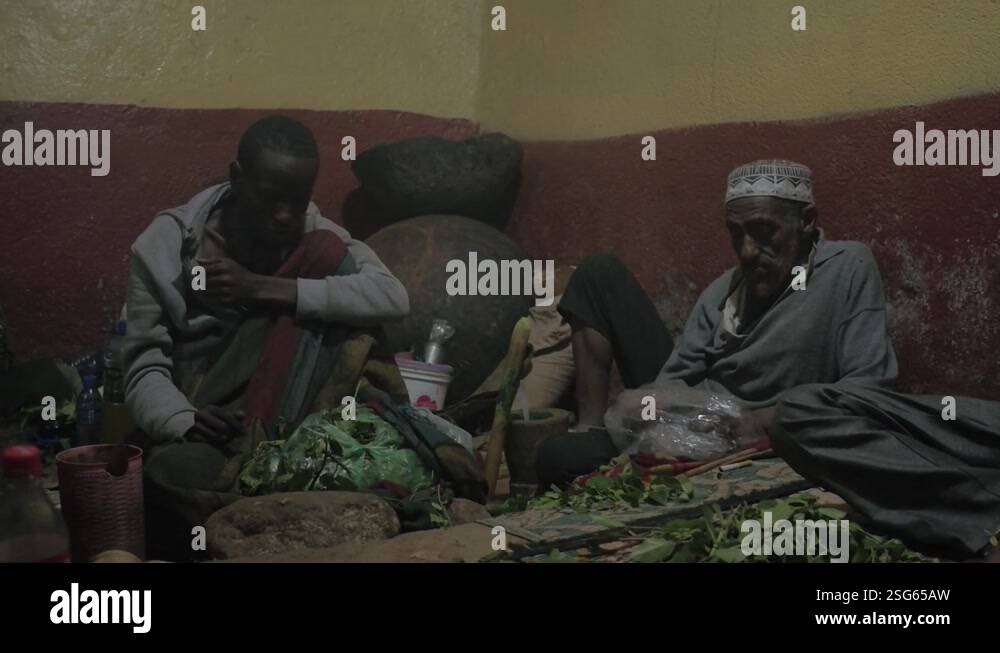 Ethiopian men chewing khat during a sufi ceremony, Harar, Ethiopia ...