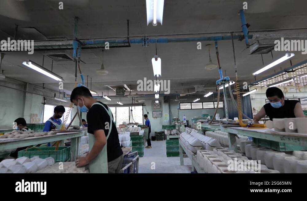 Asian Workers Working in Ceramic Factory, Wide Shot Stock Video Footage ...