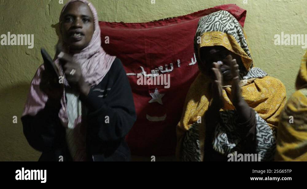 Women clapping during a sufi ceremony in Ummi Tahir Nabigar, Harar ...
