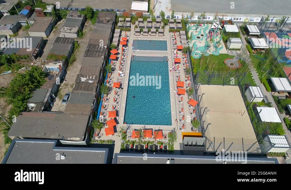 Drone aerial view people swim in pool on territory modern Residential ...