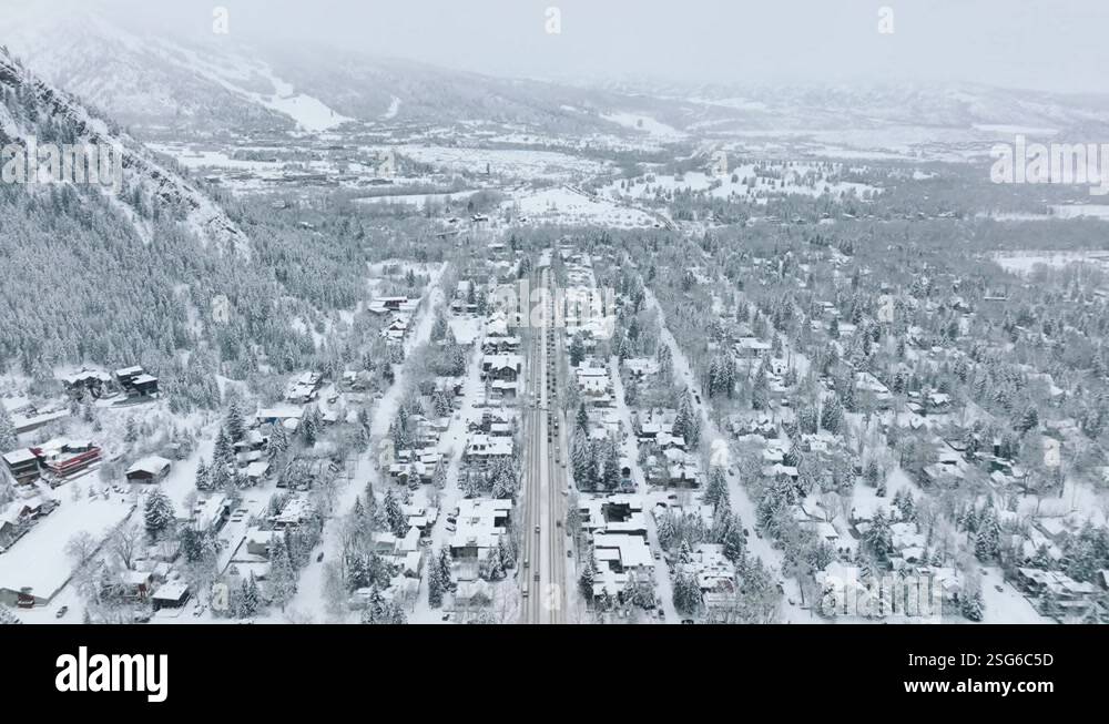 Overhead streets and rooftops covered with fresh snow in small Aspen ...