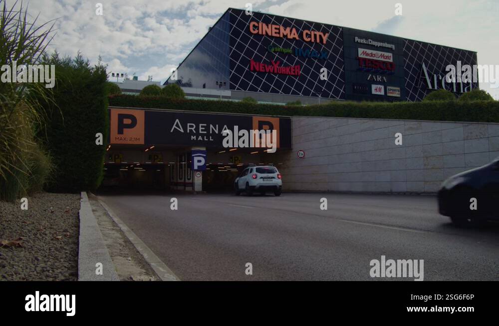 Cars drive into the Arena Plaza underground garage Stock Video Footage ...