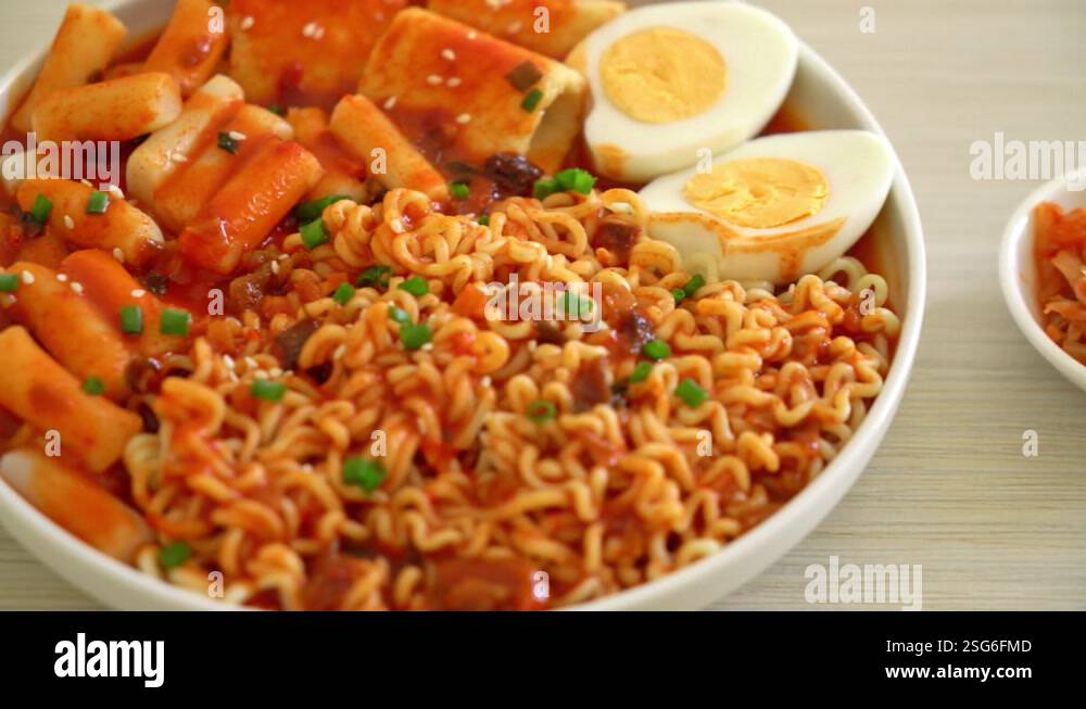Korean instant noodles with Korean rice cake and fish cake and boiled ...