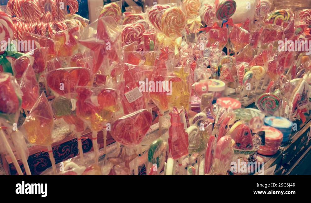 At the fair, a large number of sweets, sweet-stuff and lollipops for ...