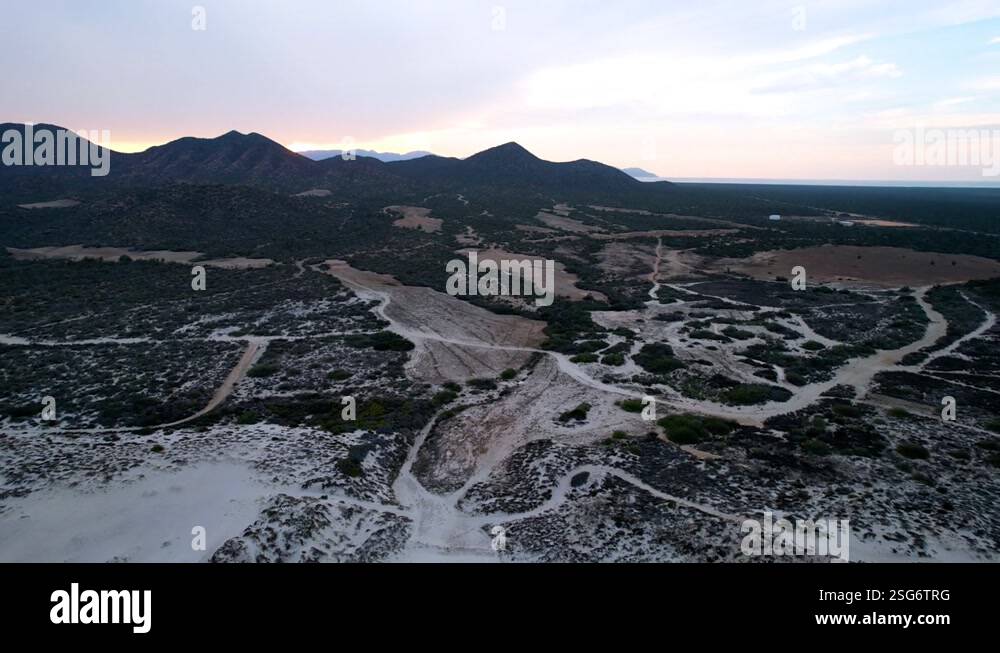 receding drone shot of the desert, dry rivers and beaches of baja Stock ...