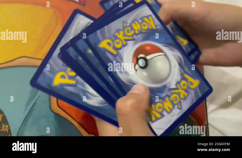 Small hands revealing Pokémon trading cards from the Sword and Shield ...