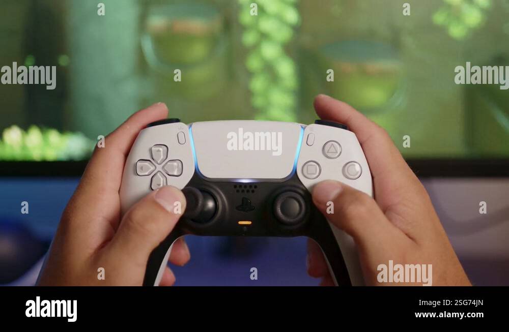 Boy Laying down his PS5 controller after gaming on his PlayStation 5 in ...