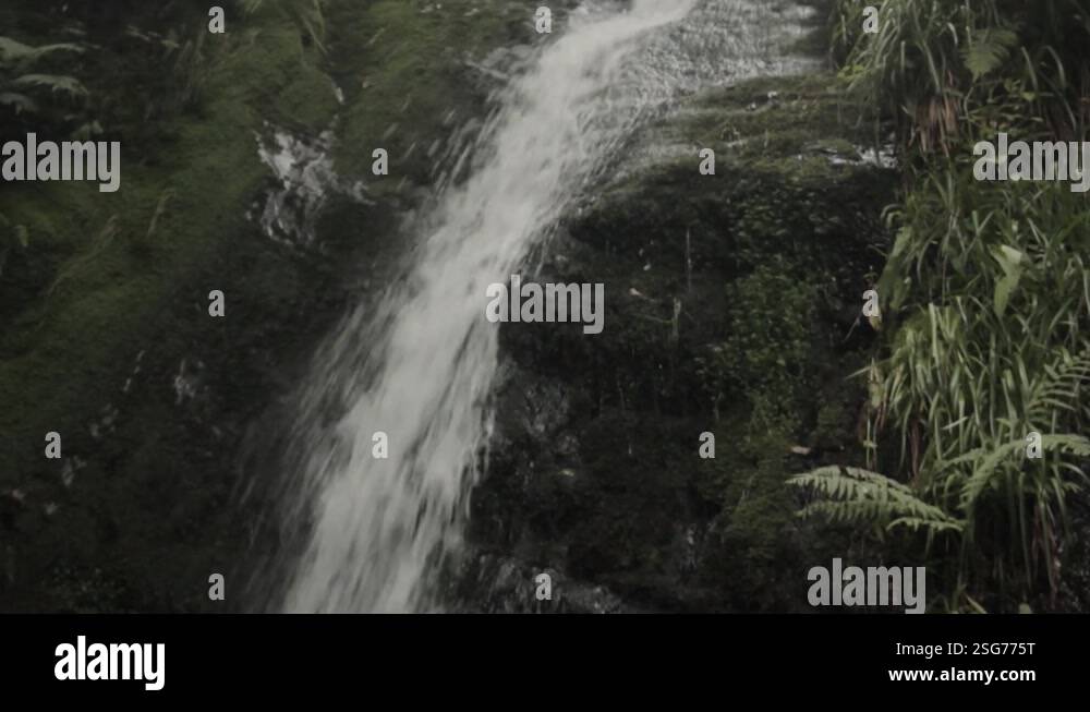 Scale Force Waterfall in England, United Kingdom, with a lush green ...