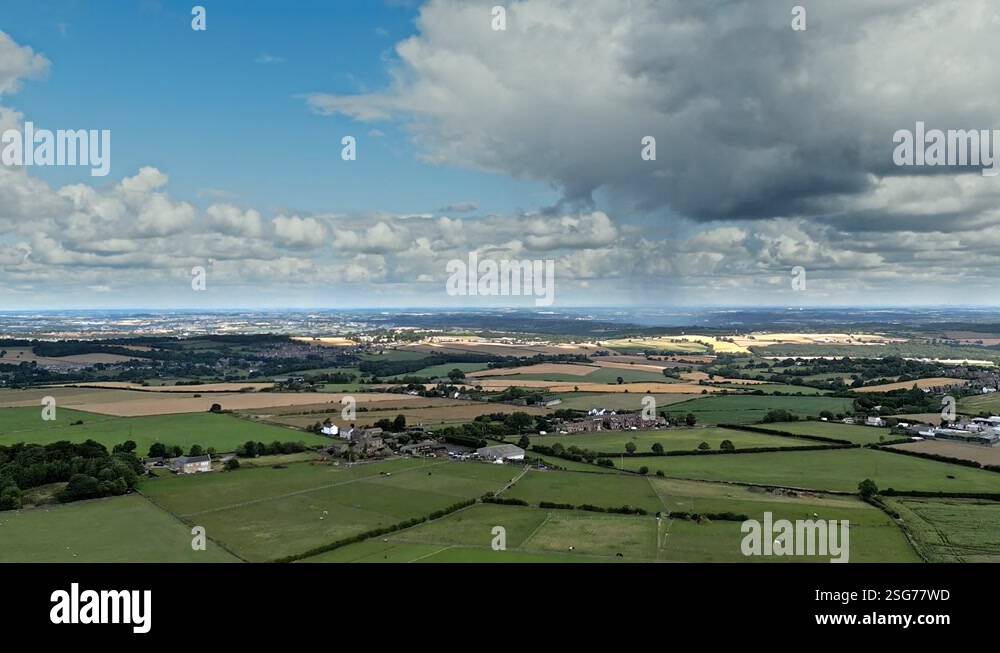 Typical Yorkshire village scene with blue sky's clouds and open ...