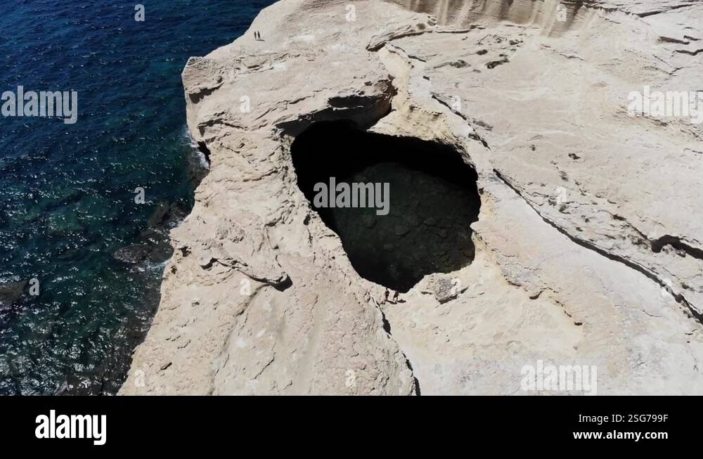 A slowly drone movement to reveal the hole inside the foreshore near ...