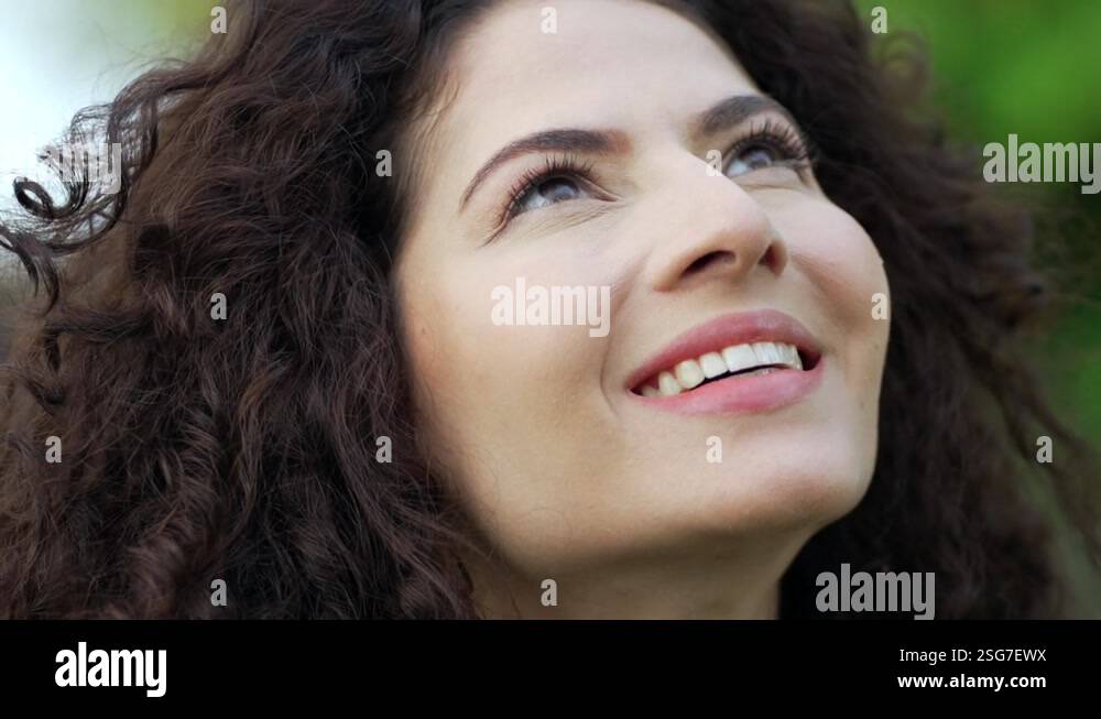 Young woman face looking at sky with HOPE and FAITH. Spiritual female ...