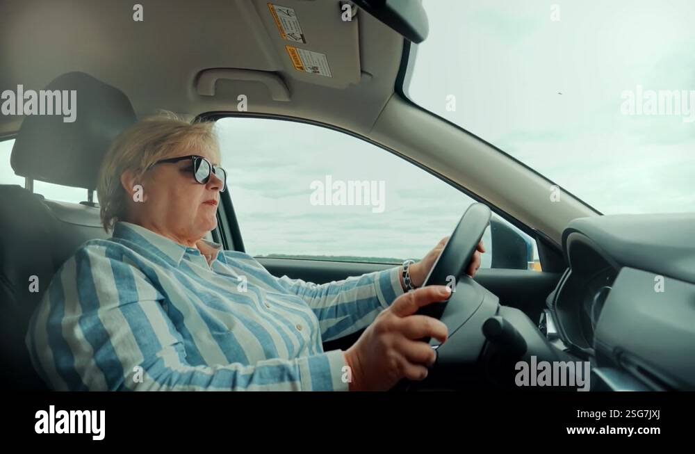 Senior Woman Driving Car. Mature Driver Car Driving. Elderly Driver ...