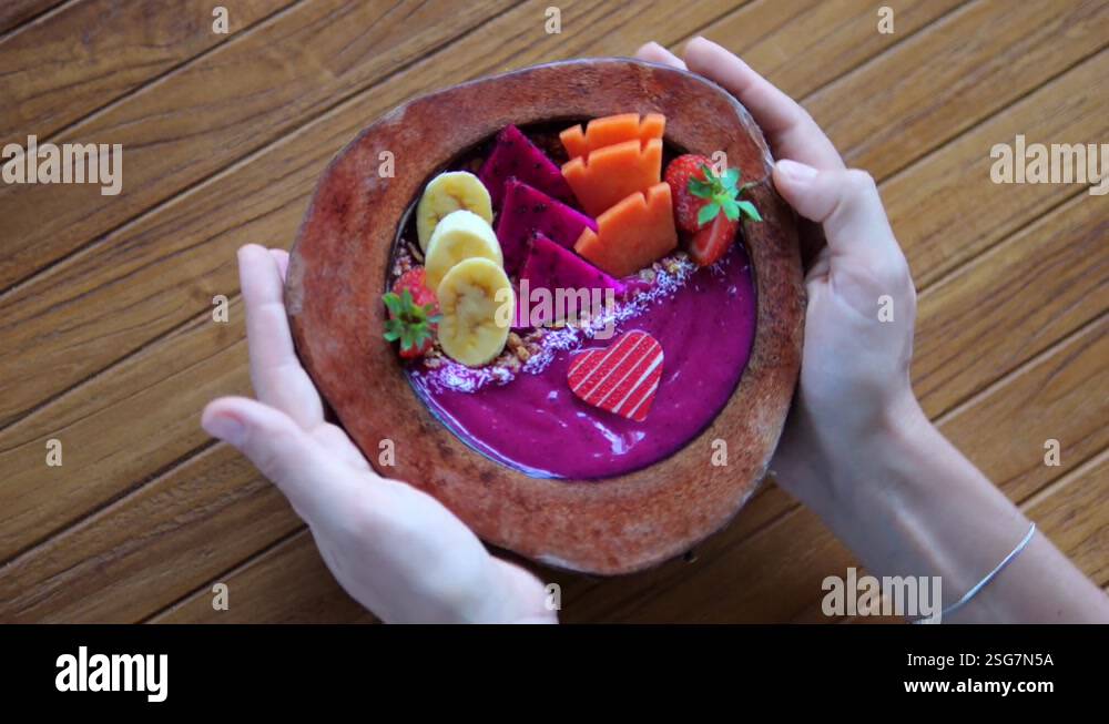 A wholesome breakfast of ripe fruits in coconut shell plates, nutrition ...