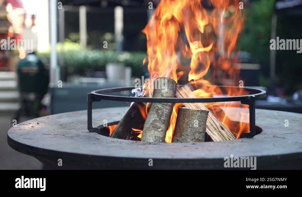 Traditional round BBQ smoker preparation for picnic party outdoor, dry ...