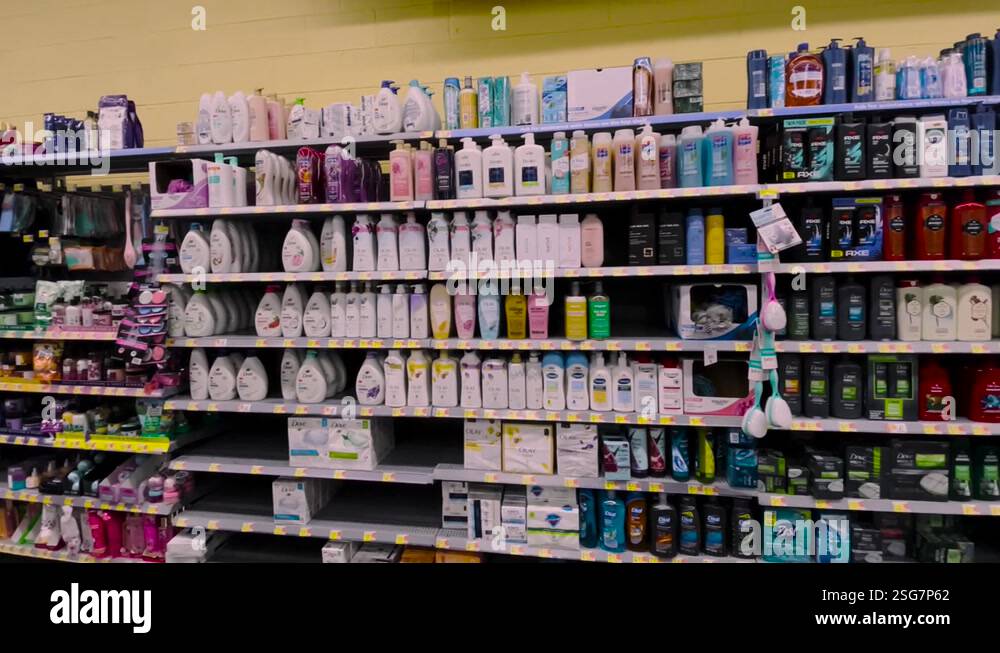 Walmart grocery store interior hair products section Stock Video Footage - Alamy