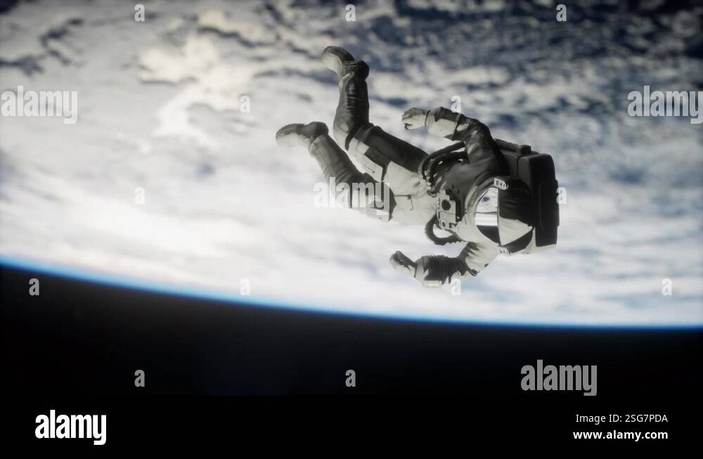 Astronaut floating above the Earth Elements of this image furnished by ...