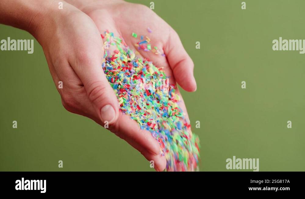 Microplastic pollution, plastic particles in hands close-up, garbage ...