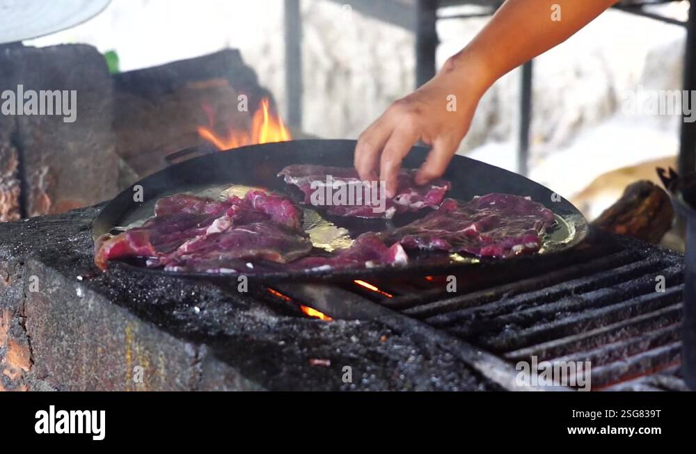 Mexican Woman cooking Authentic Mexican Cuisine On A Comal Stock Video ...
