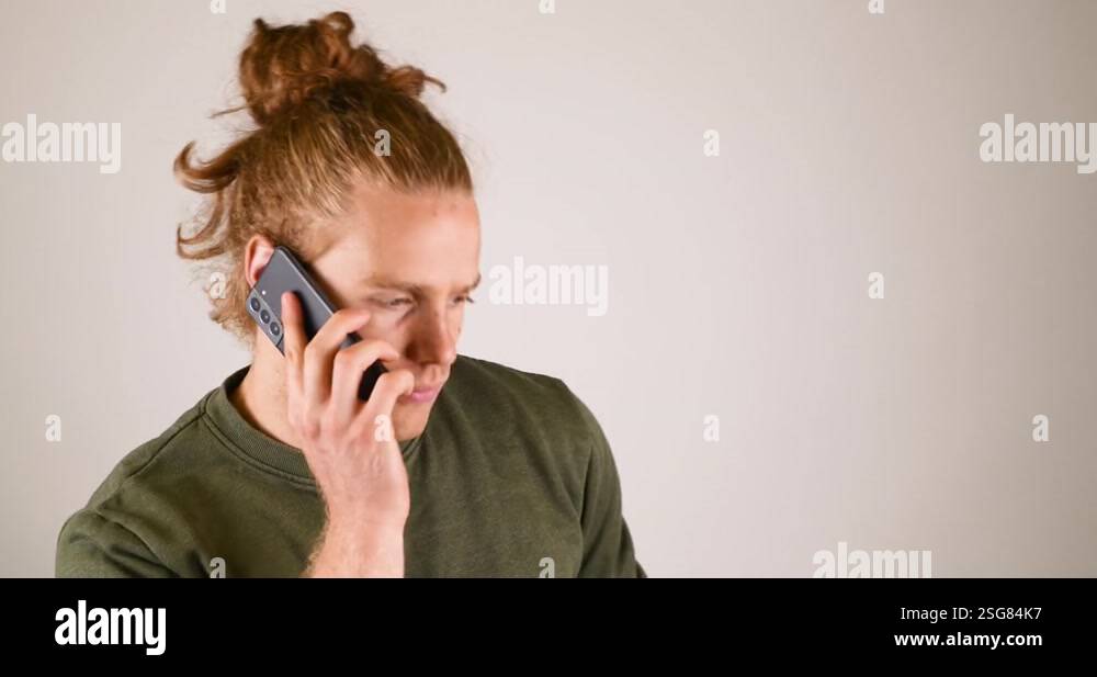 Making a phone call and receiving great news Stock Video Footage - Alamy