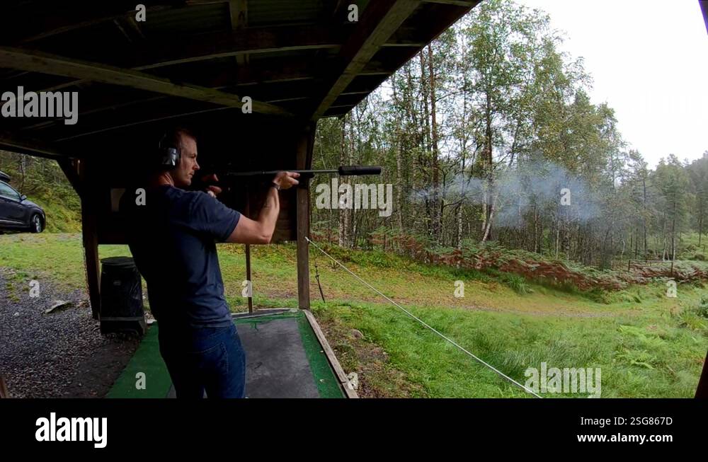 Hunter standing and aiming with a rifle Stock Videos & Footage - HD and ...