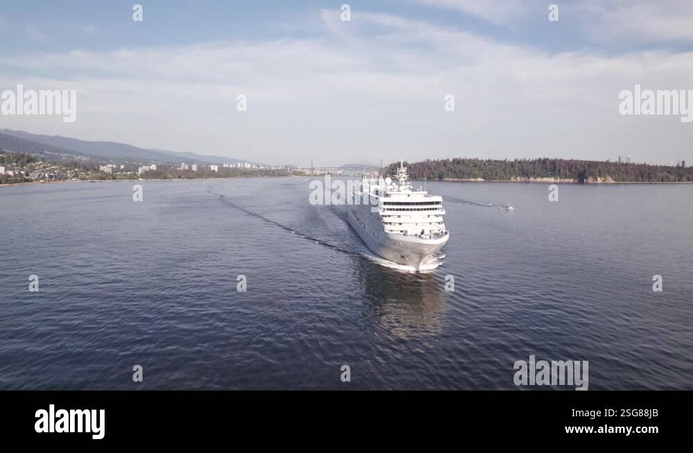 Cruise ship sailing out of Vancouver harbour at sunset, cruise line ...