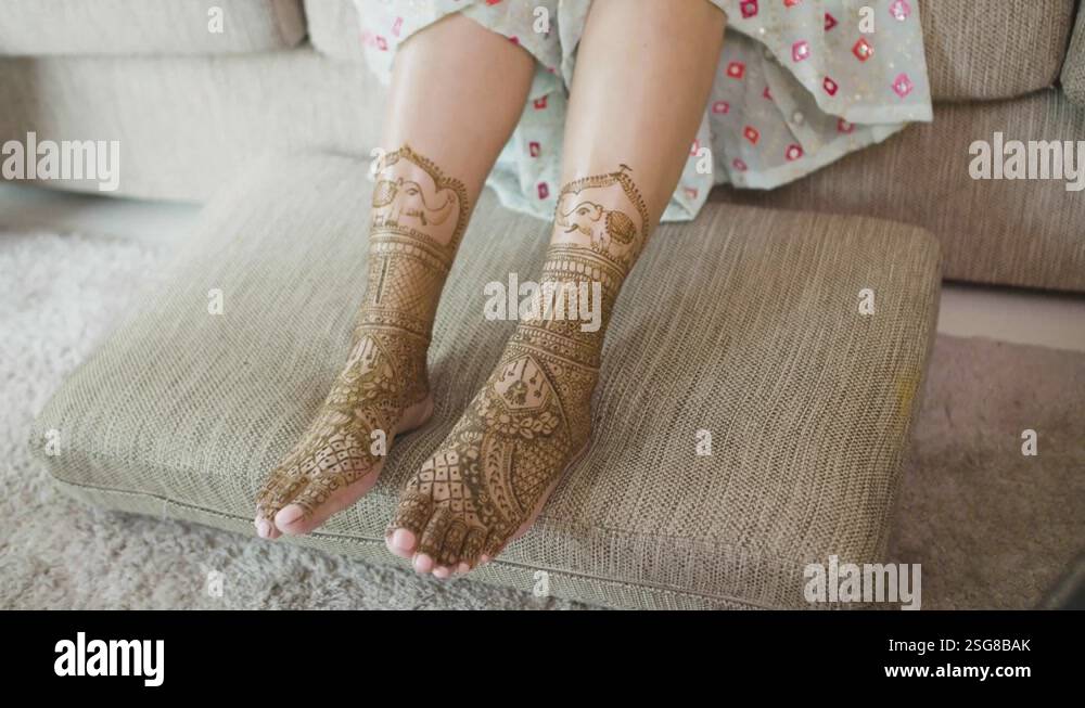 Bride's Legs With Mehndi Body Art For An Indian Wedding. - close up ...