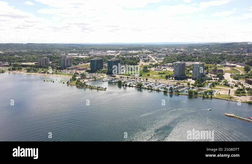 Down town barrie Beach Shore drone views going towards beach shore and ...
