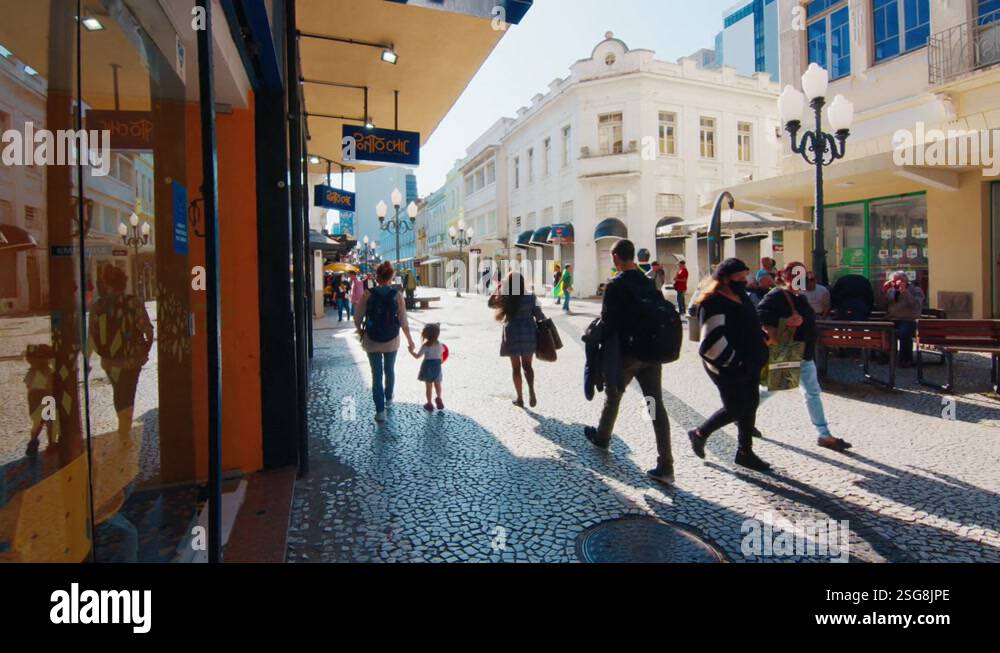 FLORIANOPOLIS, BRAZIL - SEPTEMBER 2022: People walk on the busy street ...