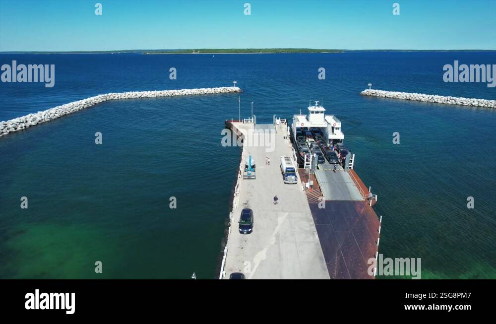Cars and trucks deboard the Washington Island Car Ferry at Northport ...