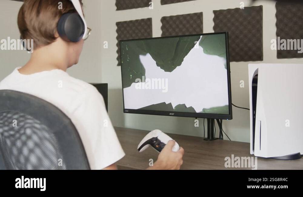 Boy Laying down his PS5 controller and headset then walking away after ...