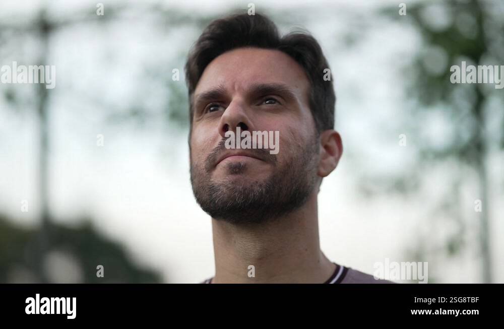Spiritual man looking up at sky with HOPE and FAITH. Contemplative ...