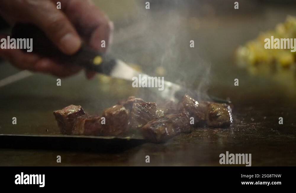 chef fry cutting stake oriental grill Stock Video Footage - Alamy