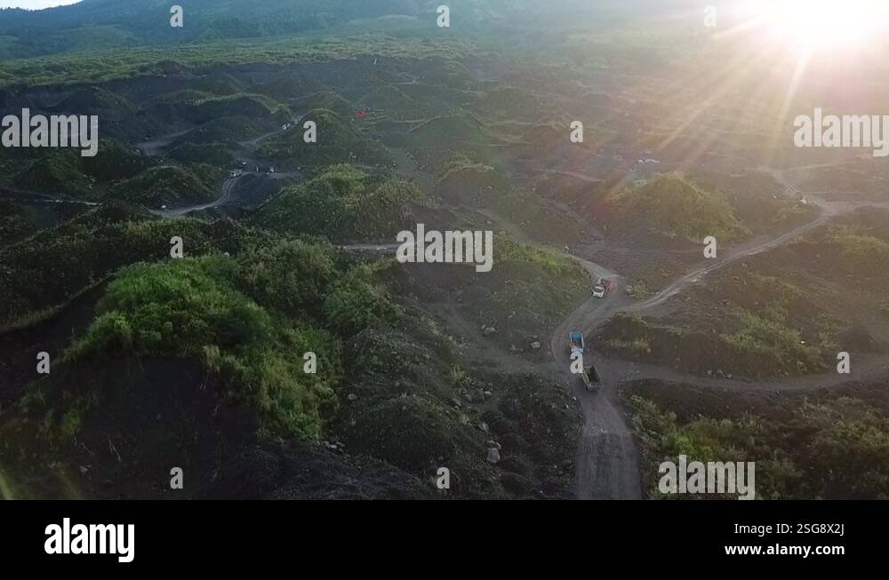 large sand mine on the slope of Merapi Volcano. sands come from volcano ...