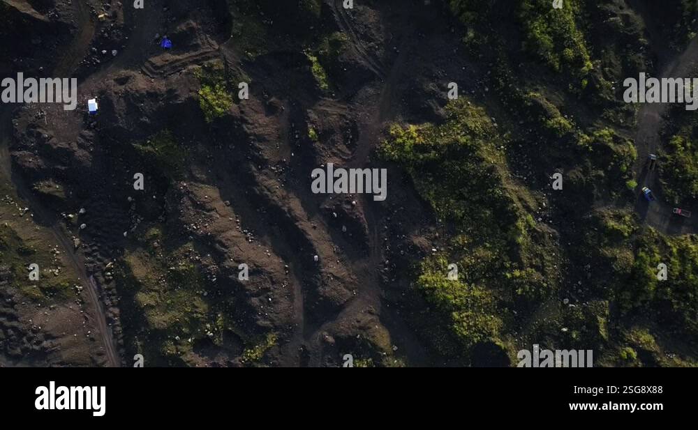 Overhead drone shot of large sand mine which causes environmental ...