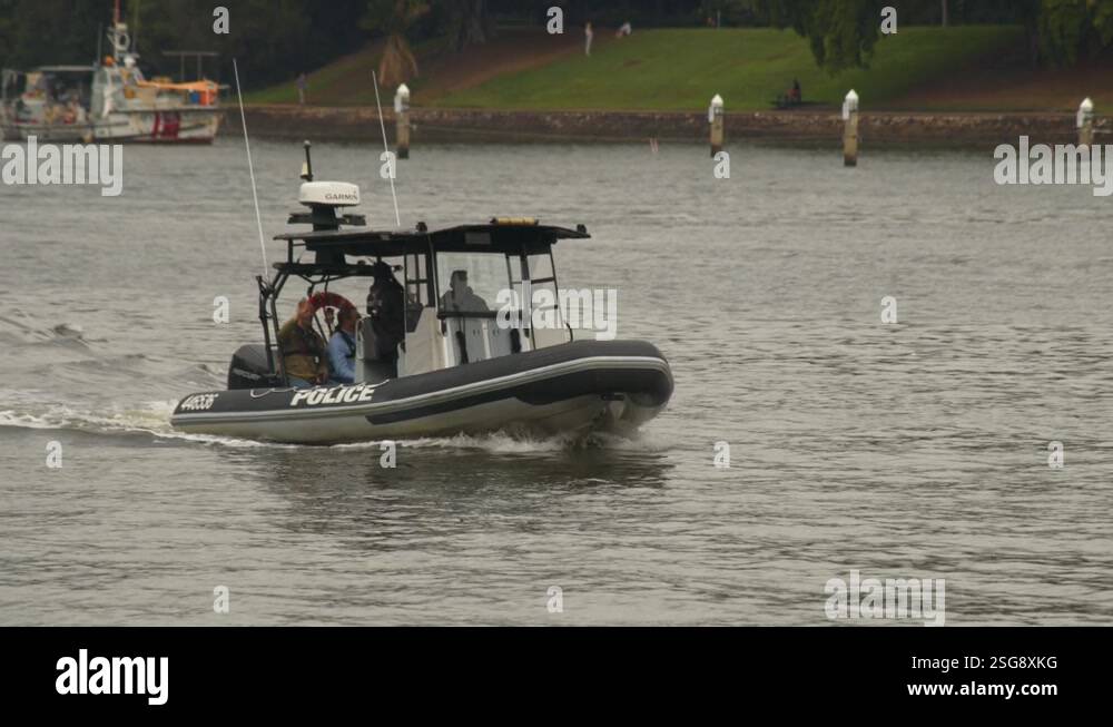 Queensland water police boat motors up the Brisbane River Stock Video ...