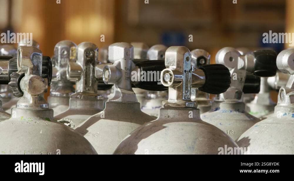 A macro shot of the top part of a group of oxygen tanks Stock Video ...