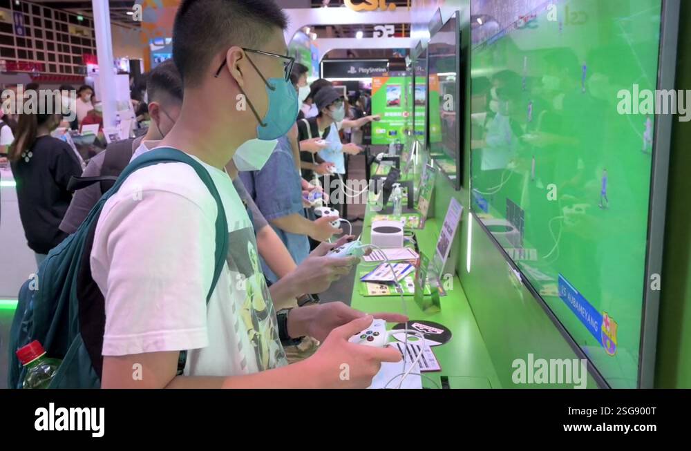 Gamers play videogames using a controller from the American video ...